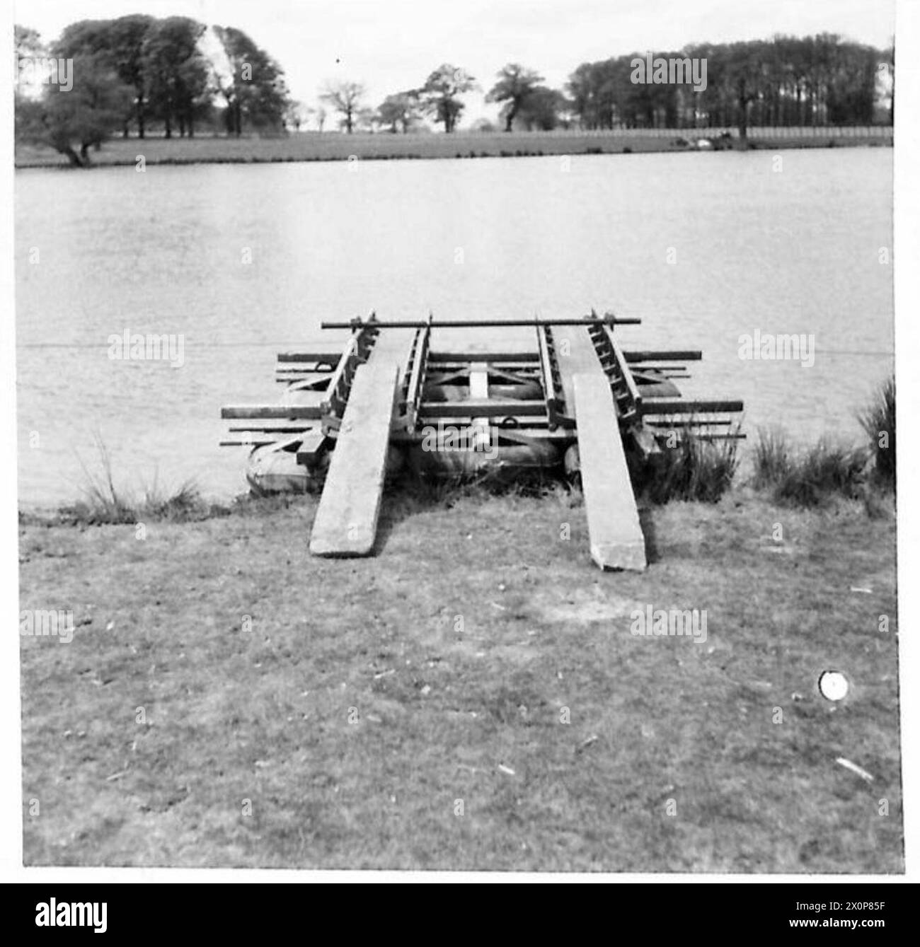 Guns and trucks are ferried using assault boats, with ramp and rubber ...