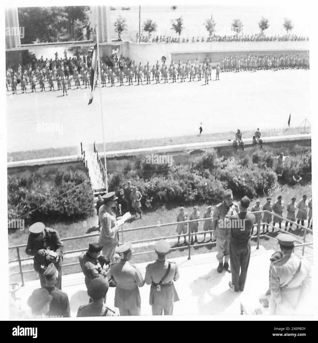Unit marching in formation with flag hi-res stock photography and ...
