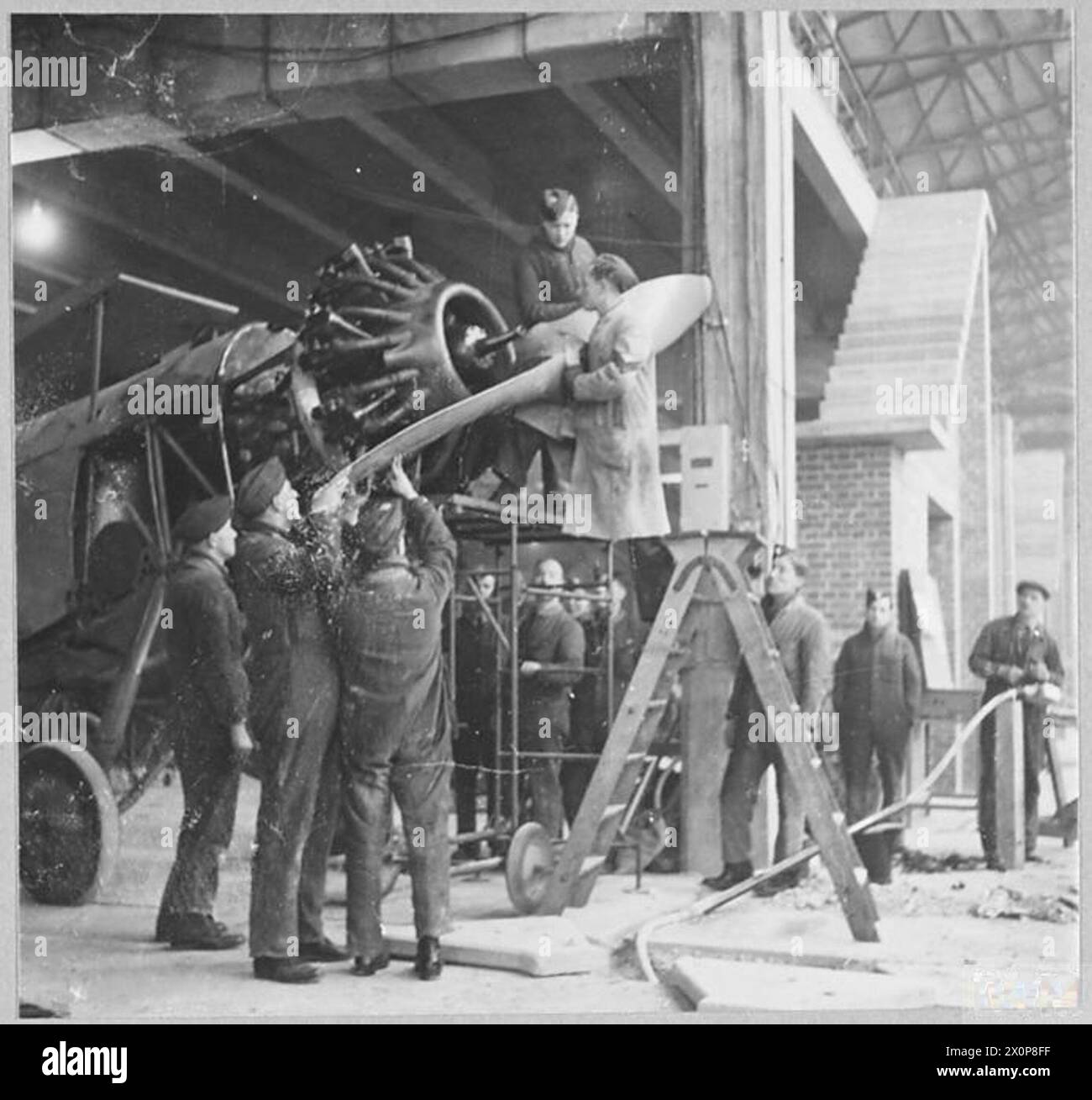 TECHNICIANS IN THE ROYAL AIR FORCE - Learning how to mount a propeller ...