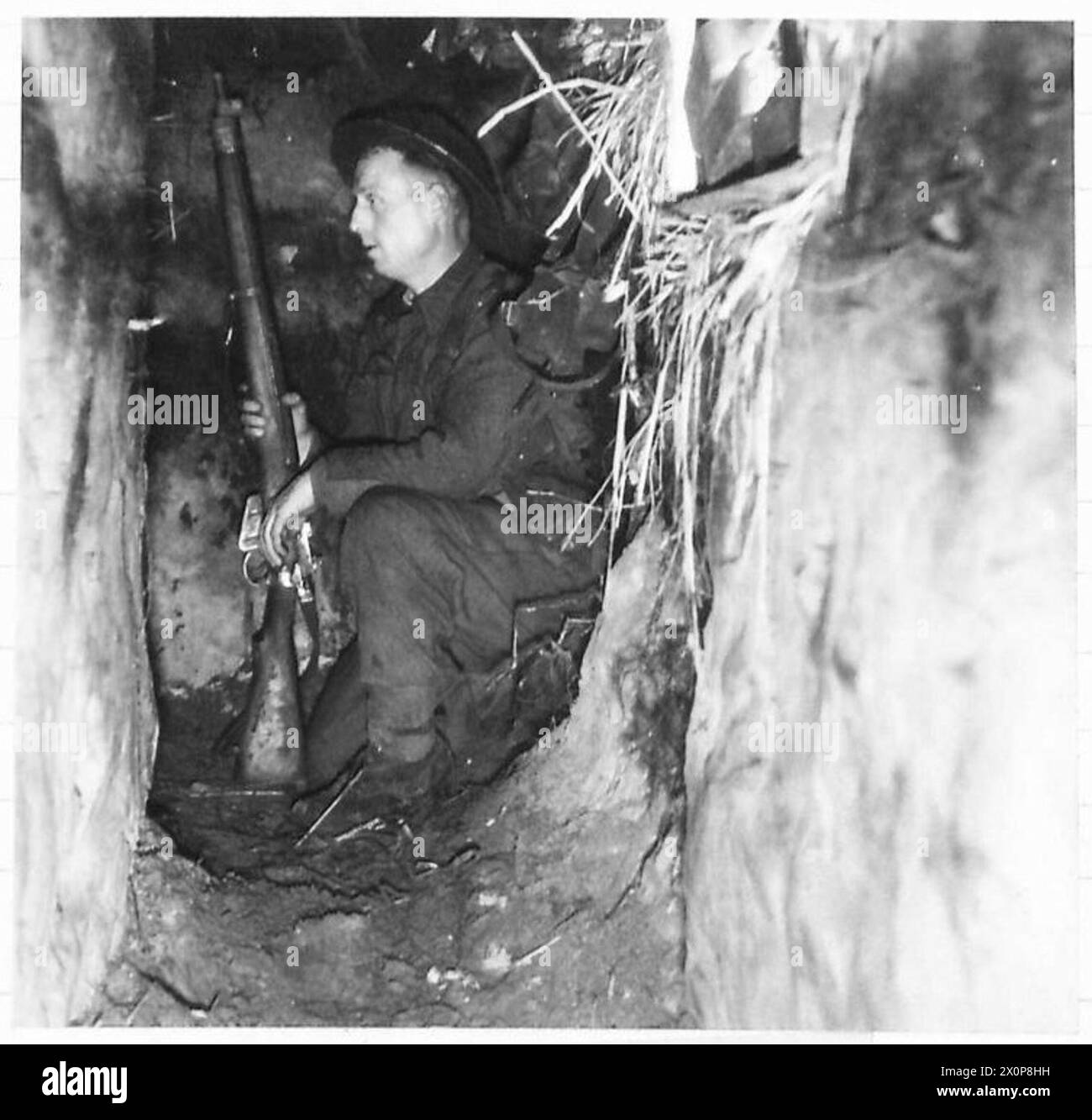 A forward troop from the South Lancashire Regiment occupies a listening ...