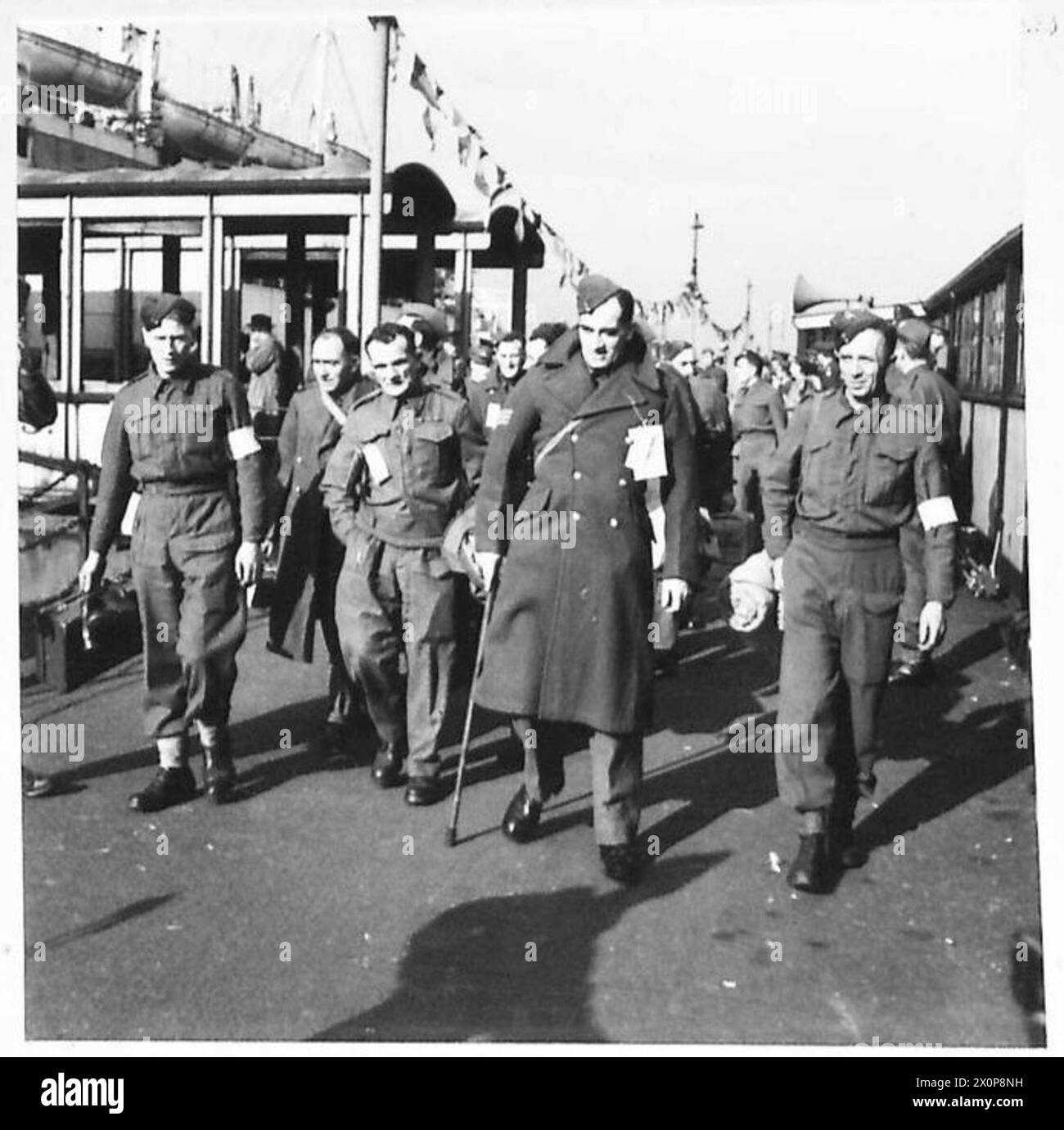 Repatriated prisoners arrive in Liverpool and are brought ashore at a ...