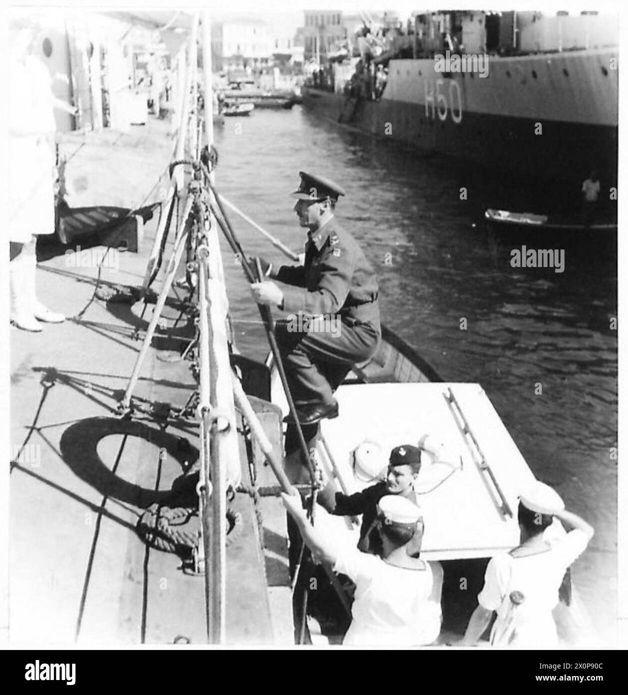 Photograph showing General Scobie, GOC-in-C Greece, climbing aboard HMS ...