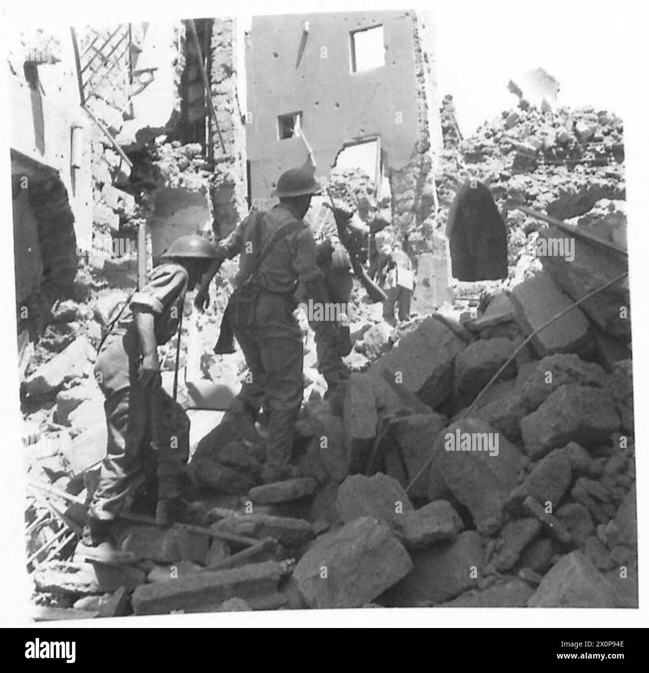 THE SURRENDER OF PANTELLARIA - Troops patrolling the devastated streets ...