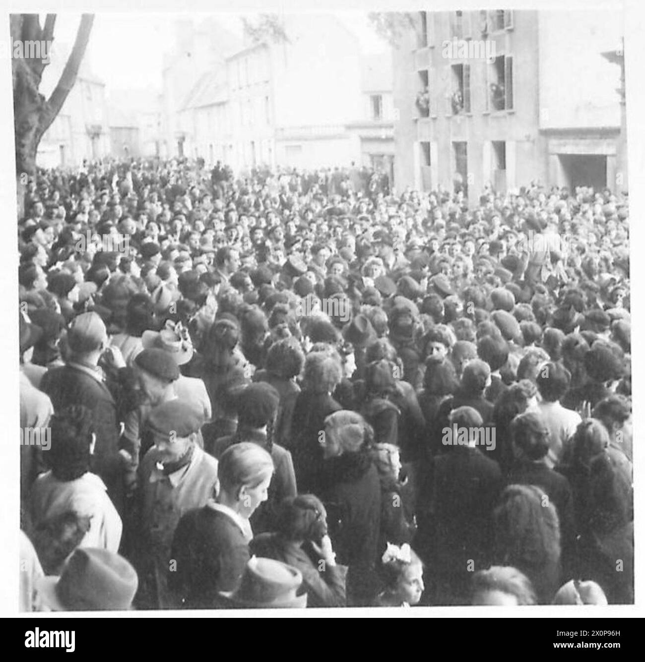 Photographic negative showing crowds listening to speeches by Allied ...