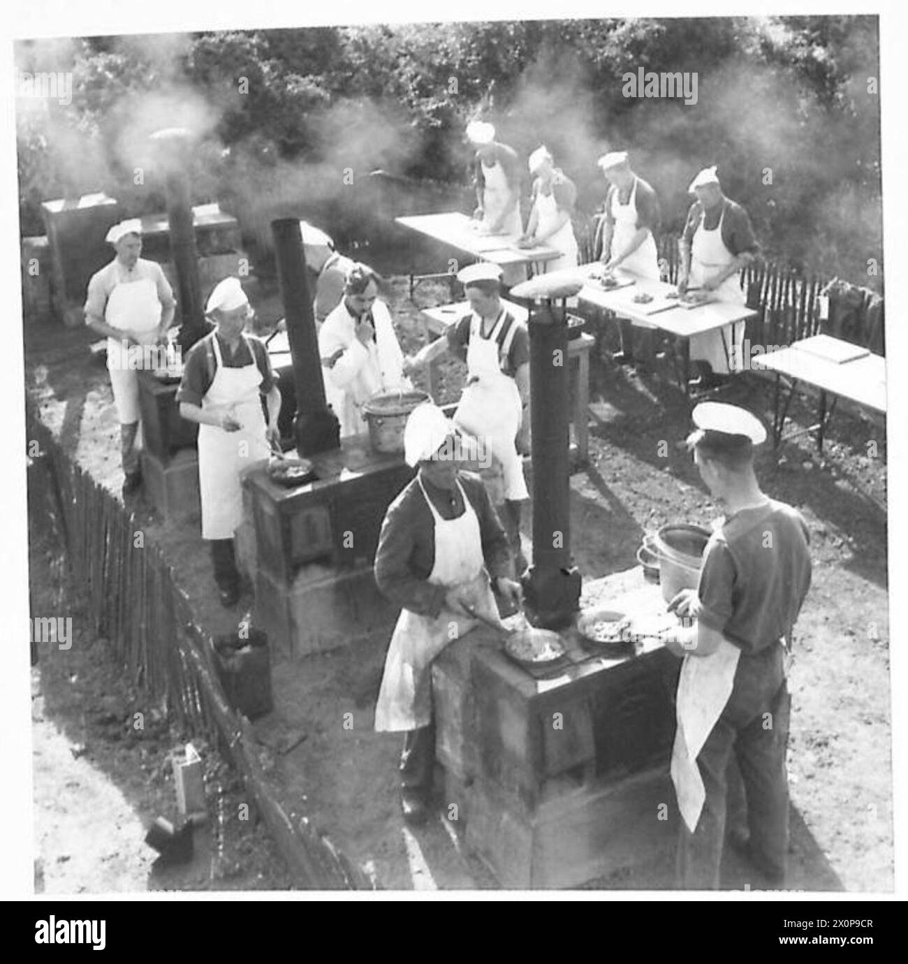 Army cooks are trained in frying techniques during a class ...