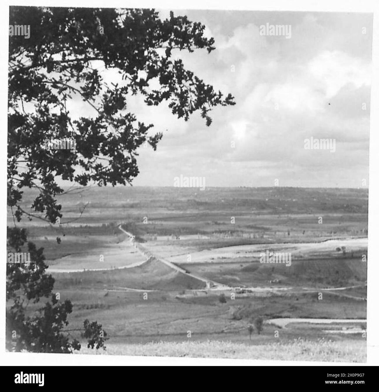 Photograph shows the Sangro River and surrounding slopes with enemy ...