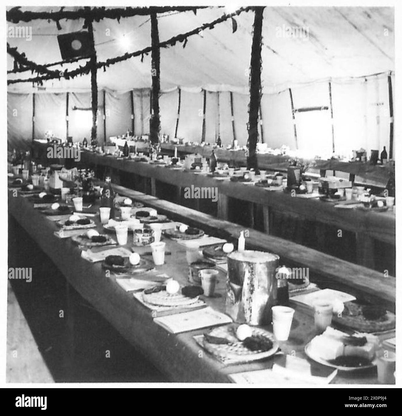 Tables are prepared for a Jewish Passover service in Italy, showing the ...