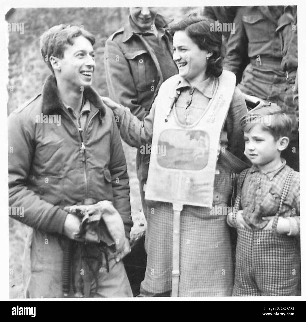 Capt. Smith stands with Signora Jolanda Nabchella, who is wearing Capt ...