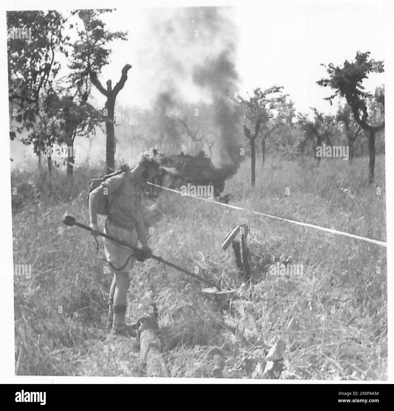 Eighth Army personnel sweep a diversion area for mines during the ...