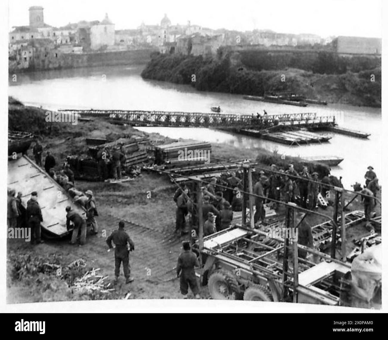 General view of construction of a floating pontoon Bailey Bridge by Royal Engineers at the Fifth ...