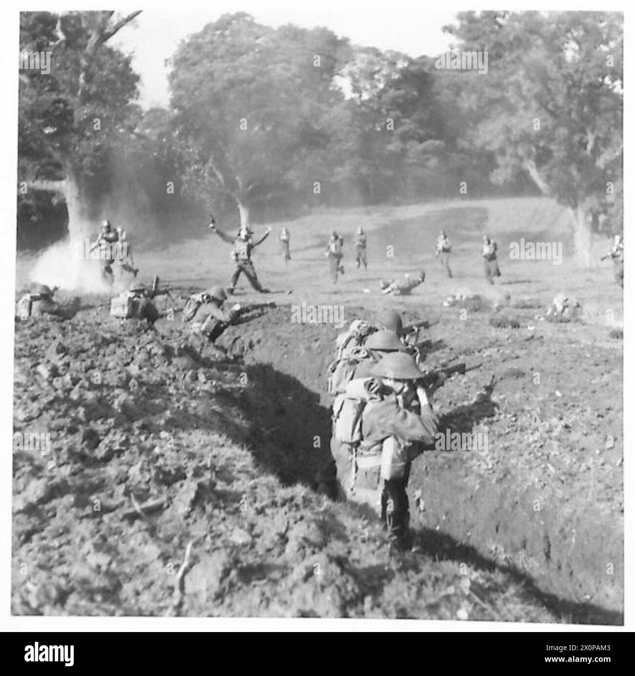 Troops in trenches conduct realistic training, responding to advancing ...