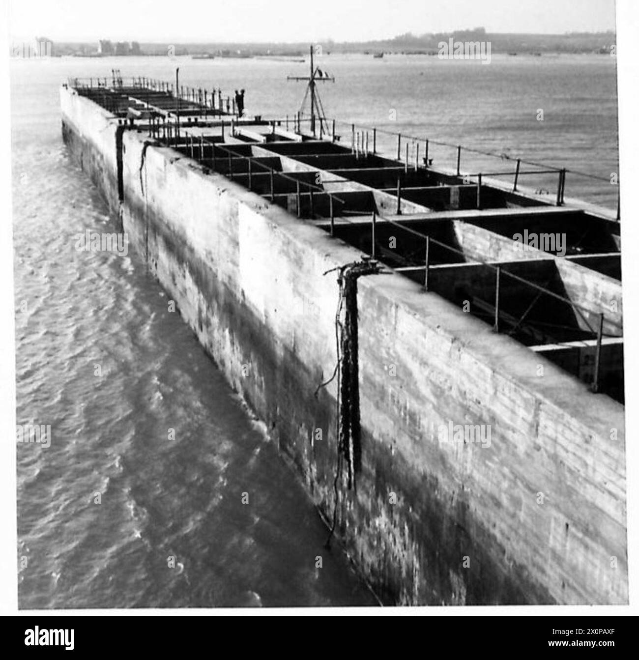 MULBERRY PORTS AT ARROMANCHES MULBERRY "B" - A damaged section and ...