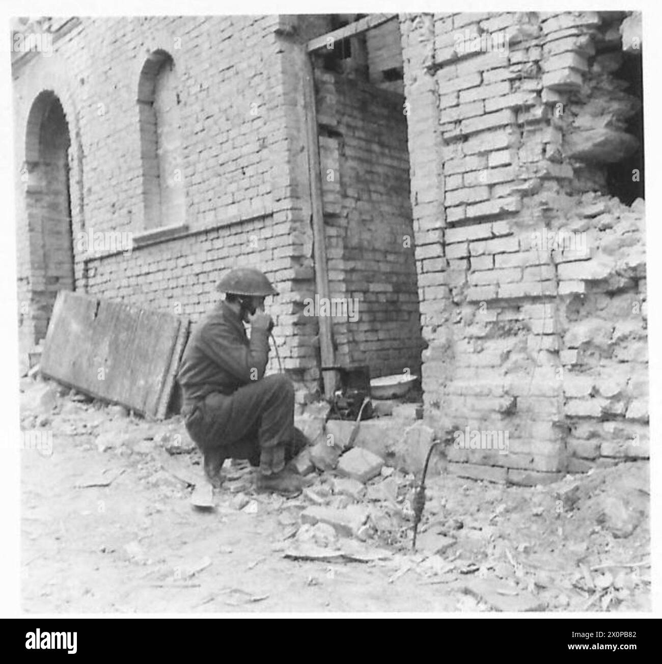Private N. Rudd of the Eighth Army communicates with the battalion ...