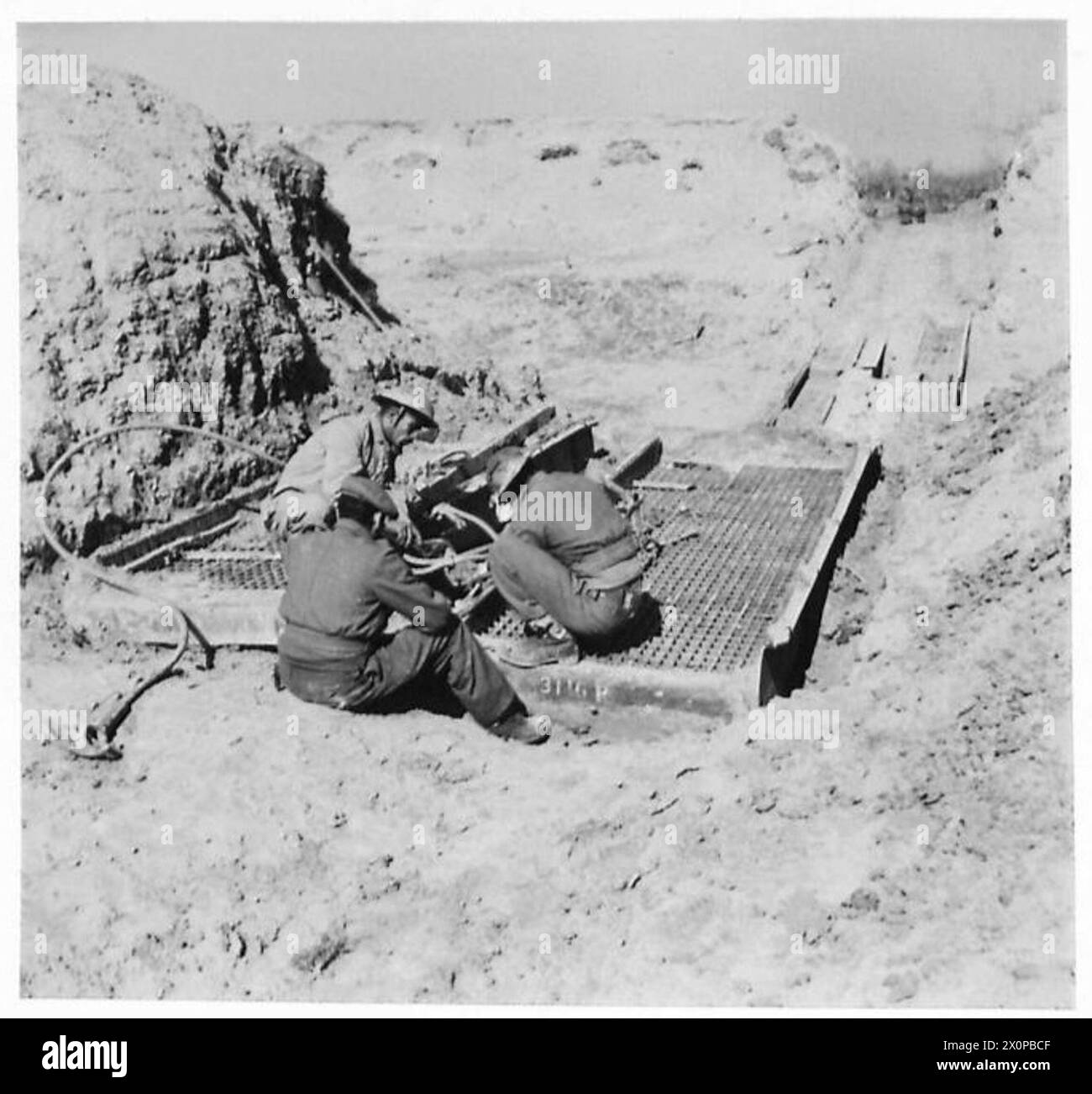 The 8th Indian Division of the Eighth Army crosses a gap in the Senio ...