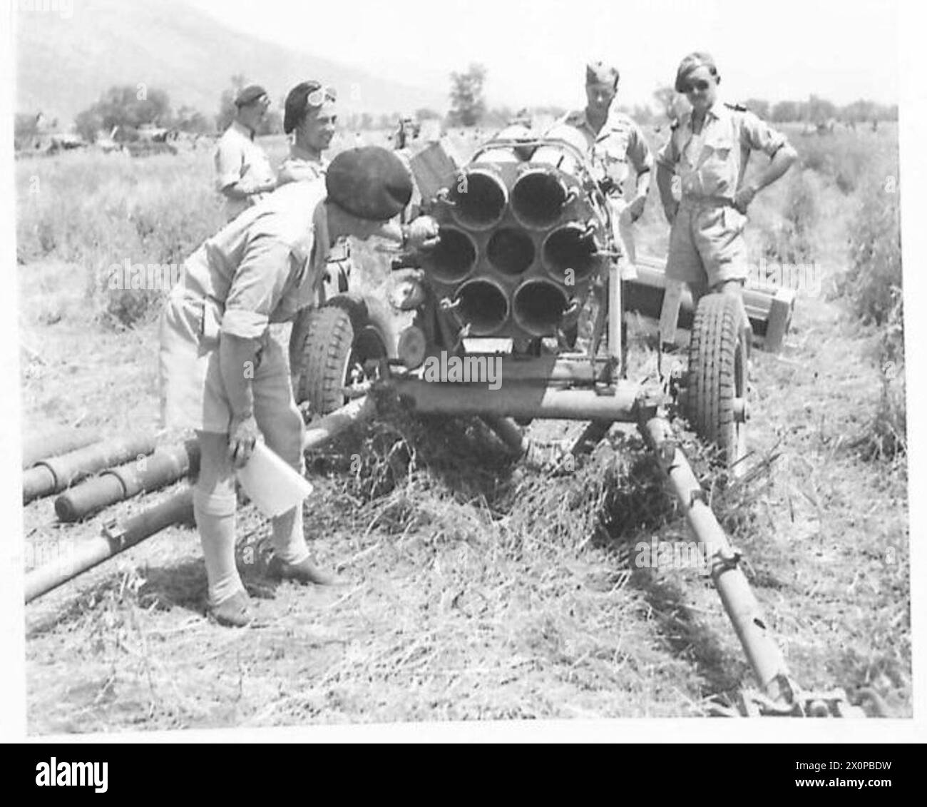 General Leese visits an exhibition of enemy equipment, including the 15 ...