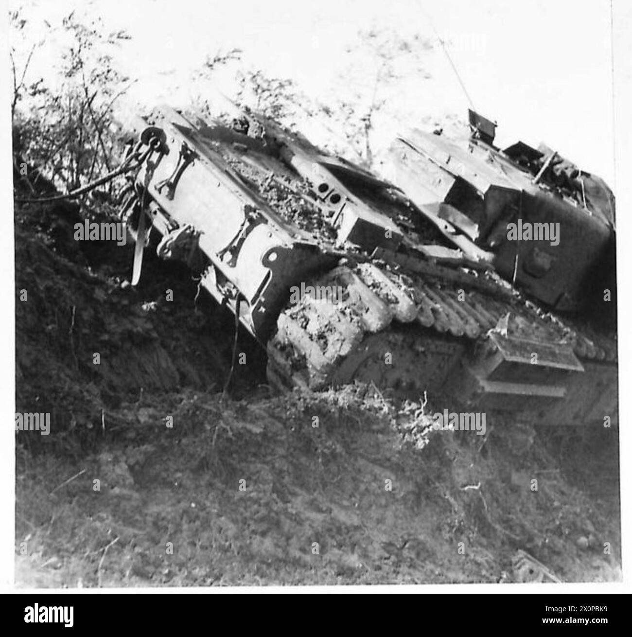 EIGHTH ARMY : AFTER THE RAINS - Close-up of the rear of the bogged tank ...