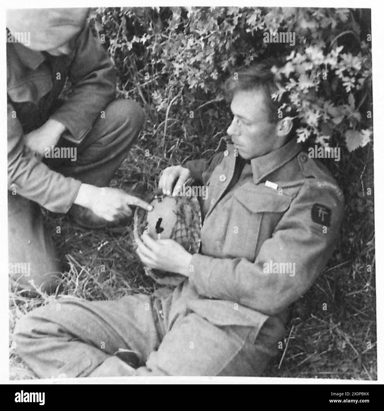 Holes in helmet Black and White Stock Photos & Images - Alamy