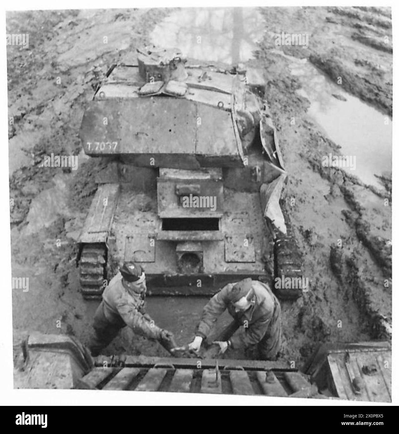 TESTING TANKS IN MUD - A Valentine tank towing a Cruiser Mk. IV through ...