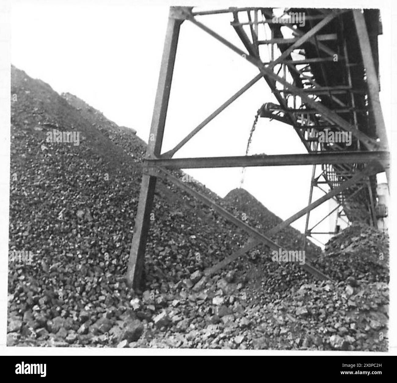 COAL FOR GREECE - The huge pile of coal at the end of the conveyor belt ...