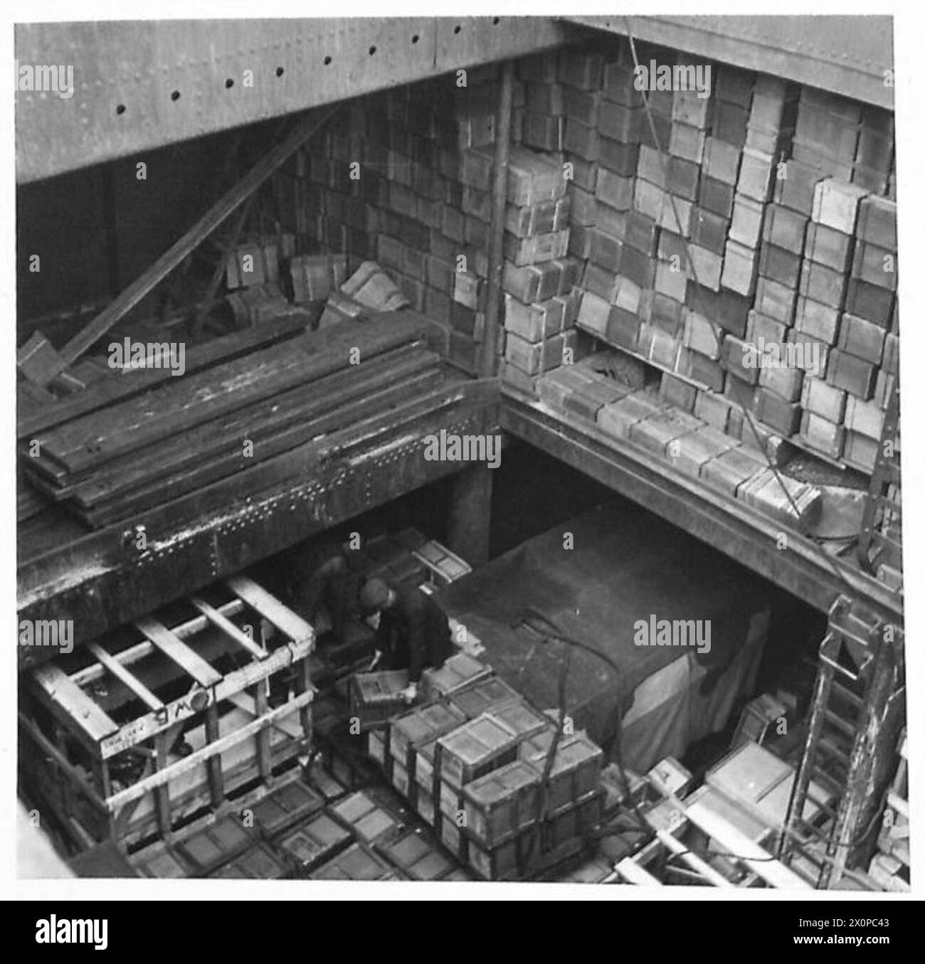 LOADING COMPO PACKS INTO SHIPS - Compo packs being loaded into a ship ...