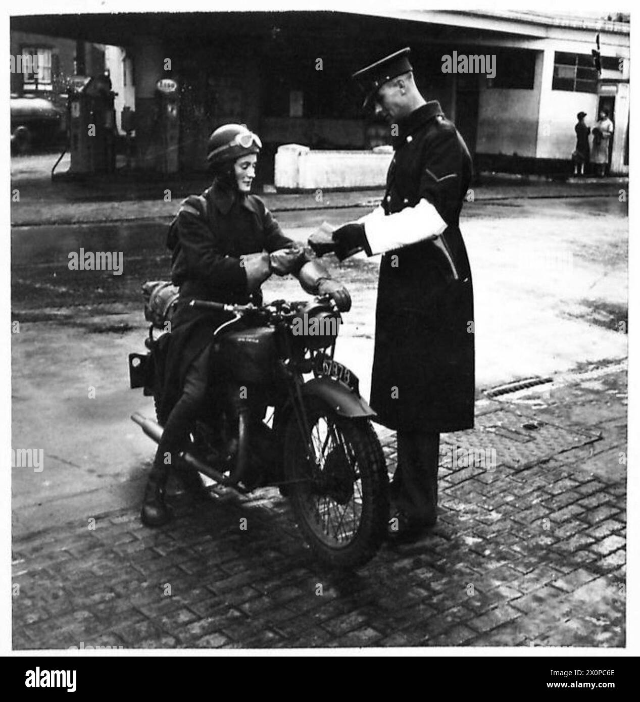 Rider wearing a helmet Black and White Stock Photos & Images - Alamy