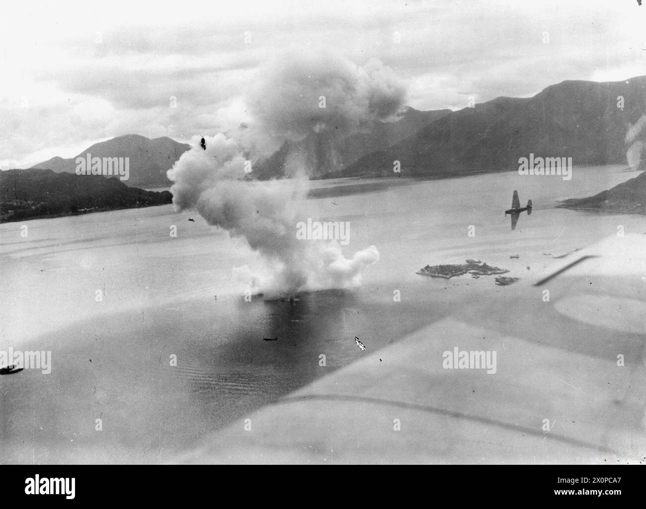 Seafires and Avengers from HMS Trumpeter and HMS Furious circle the ...