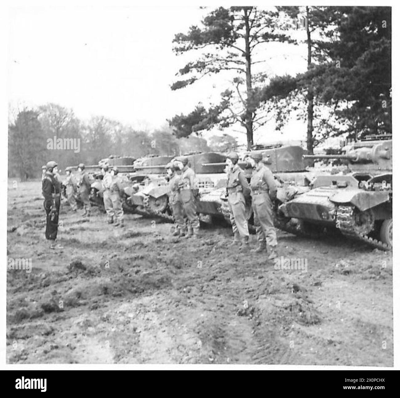 A captain issues final instructions to an armoured division during tank ...