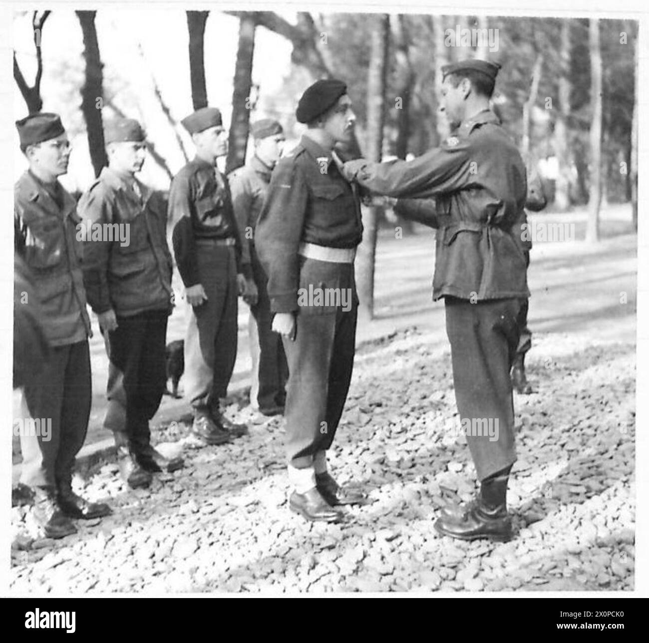 GENERAL DOOLITTLE MEETS GENERAL CLARK - Lieut. General Clark pins the ...