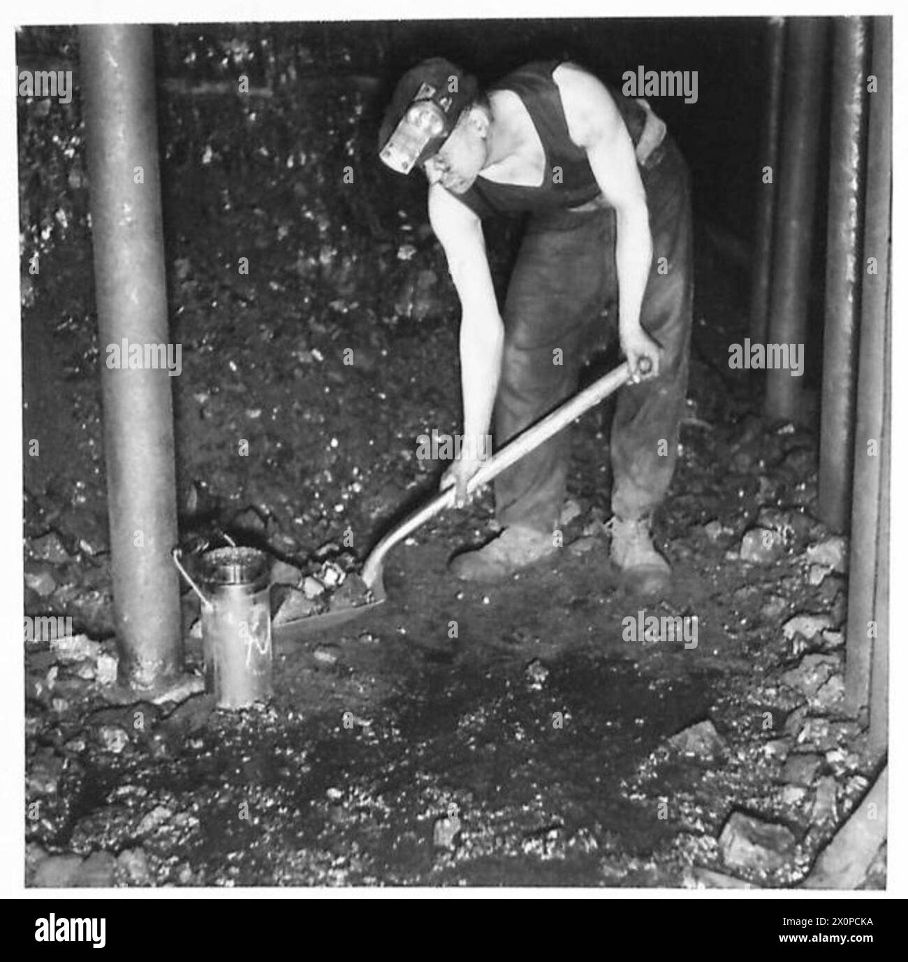 " ONE MAN FOOD CONTAINER " - A miner at work on the coal face ...