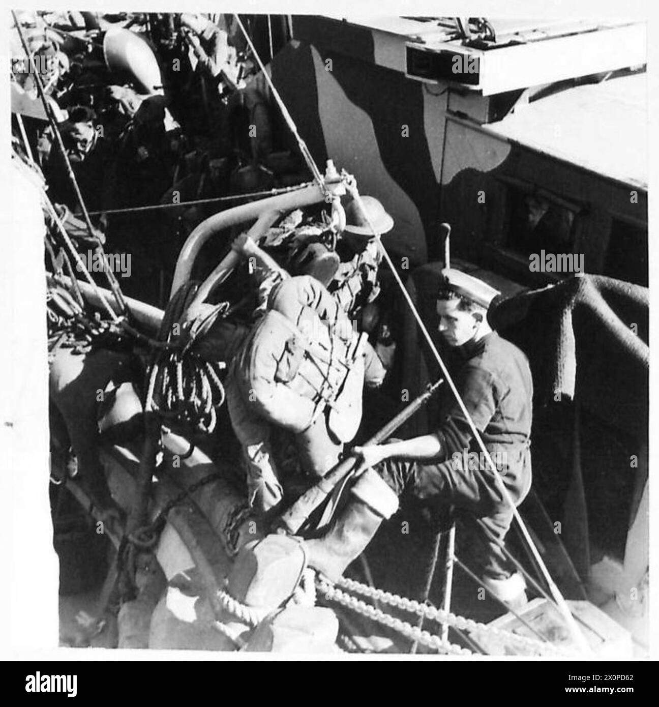 Men of 9 Commando disembark from motor torpedo boats at Salonika harbour as part of the main ...