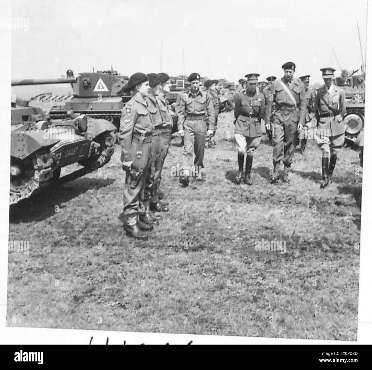 The King inspects personnel and armoured vehicles of the Royal Armoured ...