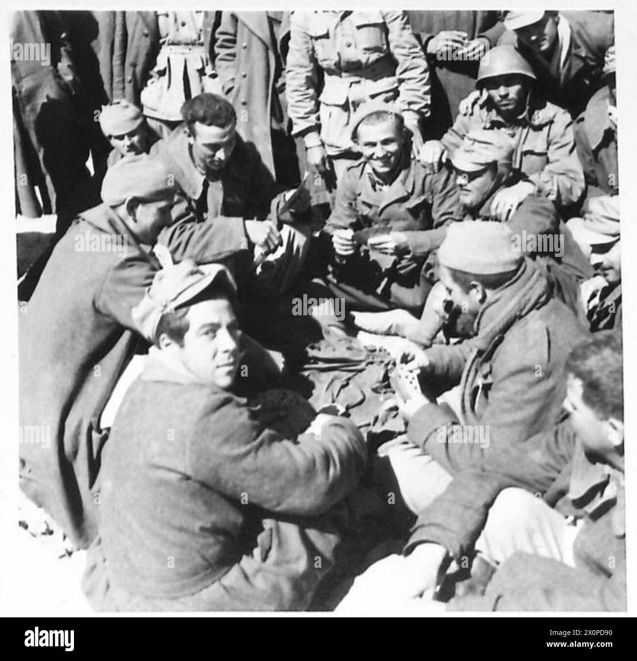 FIRST ARMY TAKE PRISONERS IN GAFSA PUSH - Italian prisoners playing ...