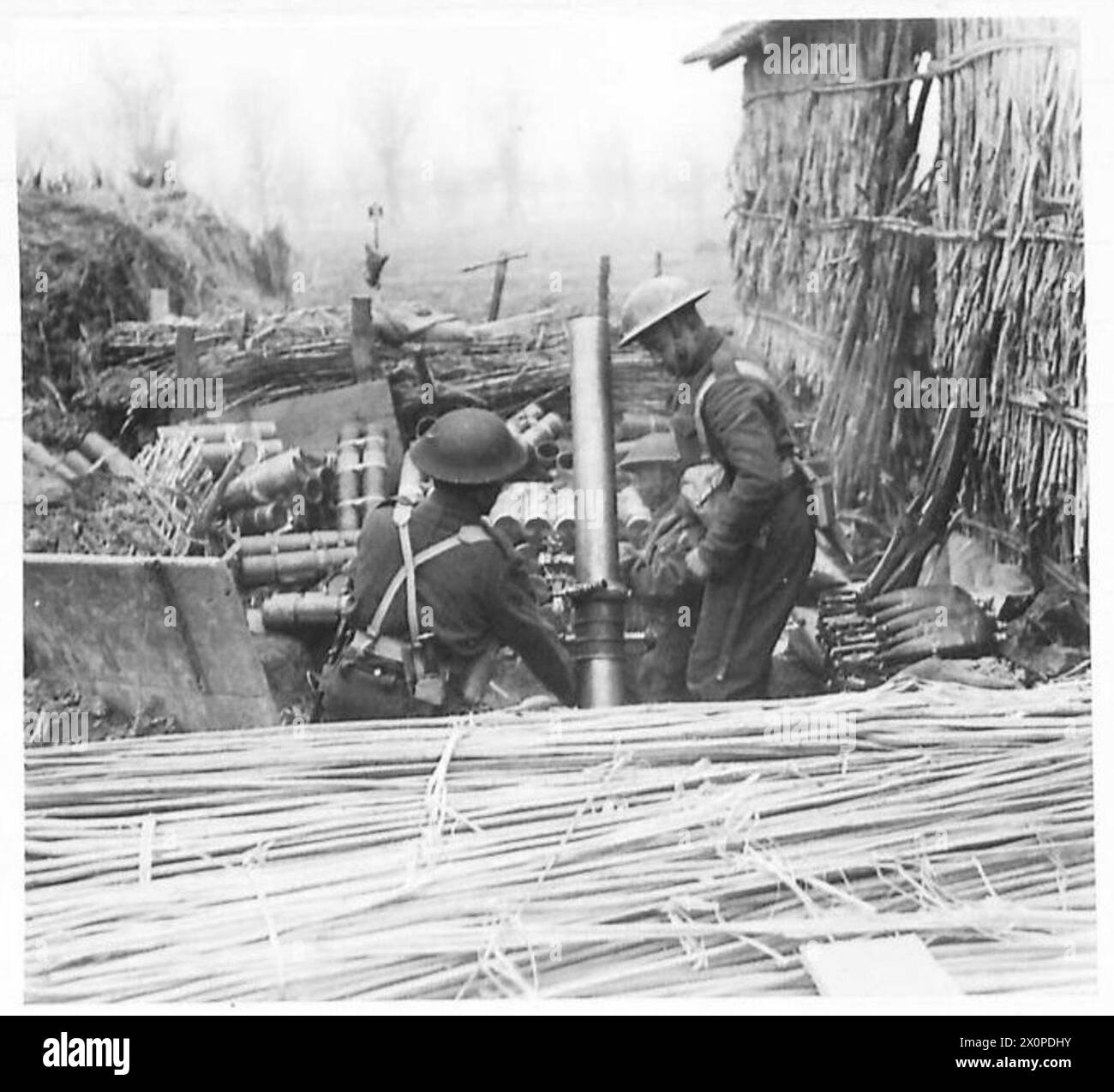 Gurkha troops of the Eighth Army operate 4.2-inch mortars against an ...
