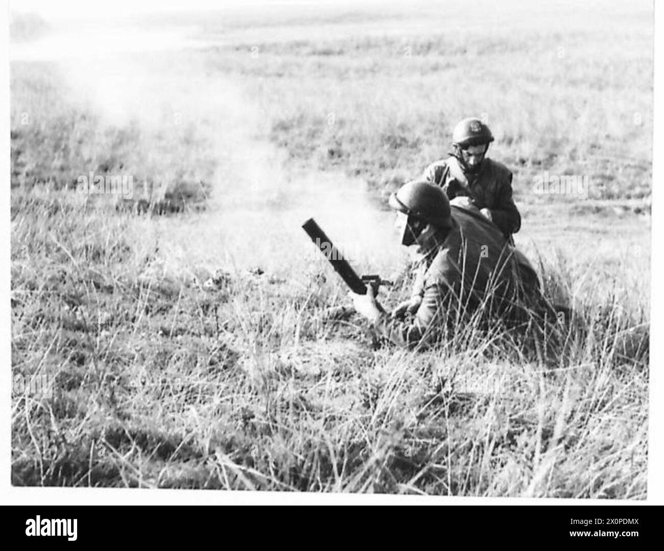 Photograph shows a paratroop mortar section of the 4th Cadre Rifle ...