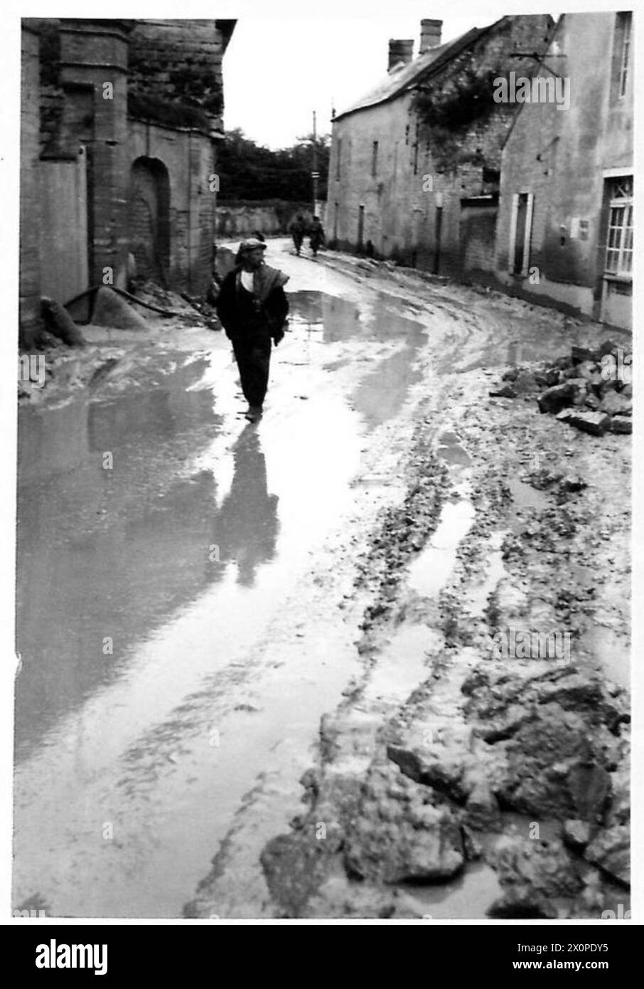 MUD IN FRANCE - This is the village street at Cully after the recent ...