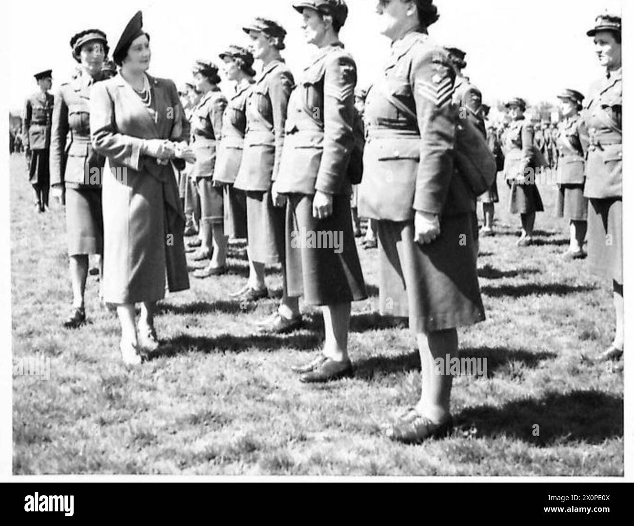 The Queen inspects members of the Auxiliary Territorial Service (ATS ...