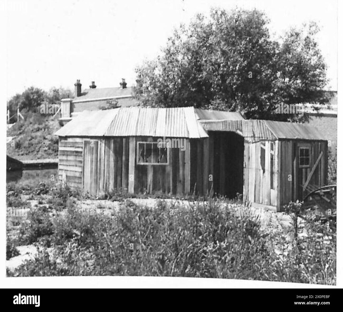 Camouflaged pillboxes are shown as defensive positions used by the ...