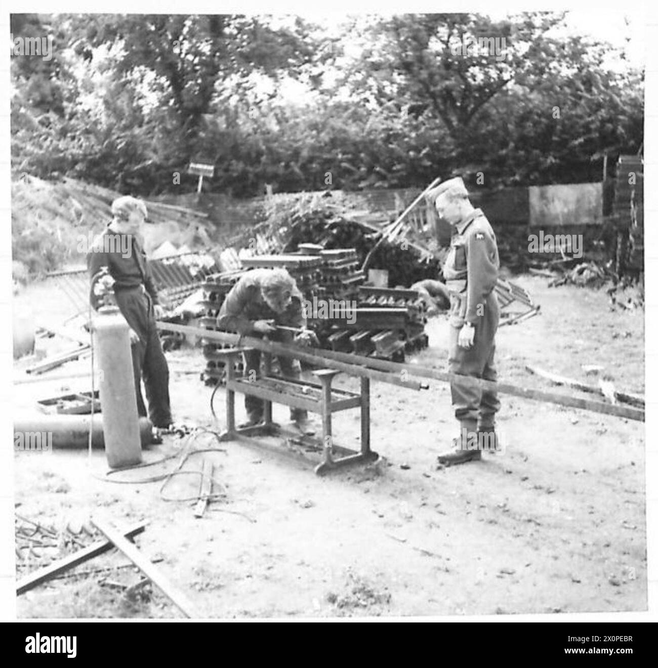 Tram lines are cut into sections using an oxy-acetylene flame to ...