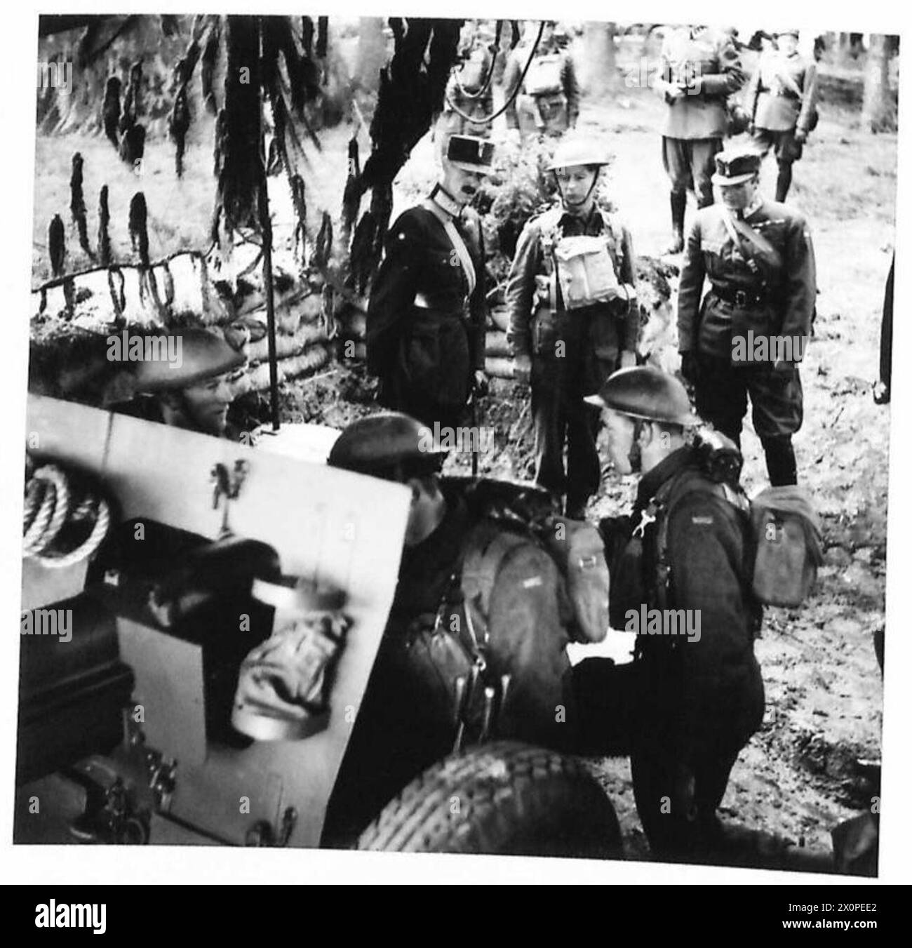 King Haakon and Prince Olav inspect French 75mm guns used by Norwegian ...