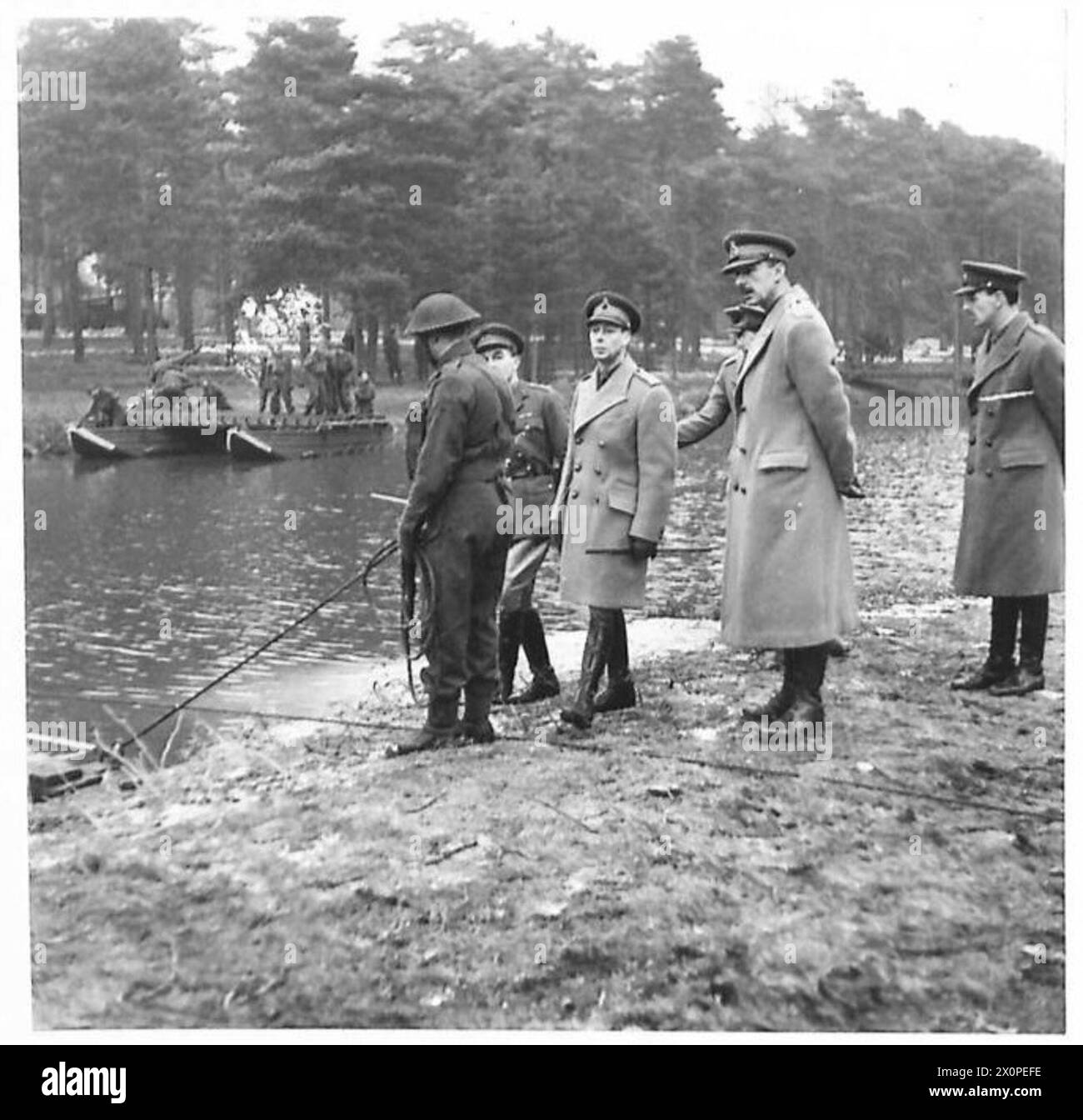 H.M. THE KING SEES ARMY "HARDENING" TACTICS - Bridging parties at work ...