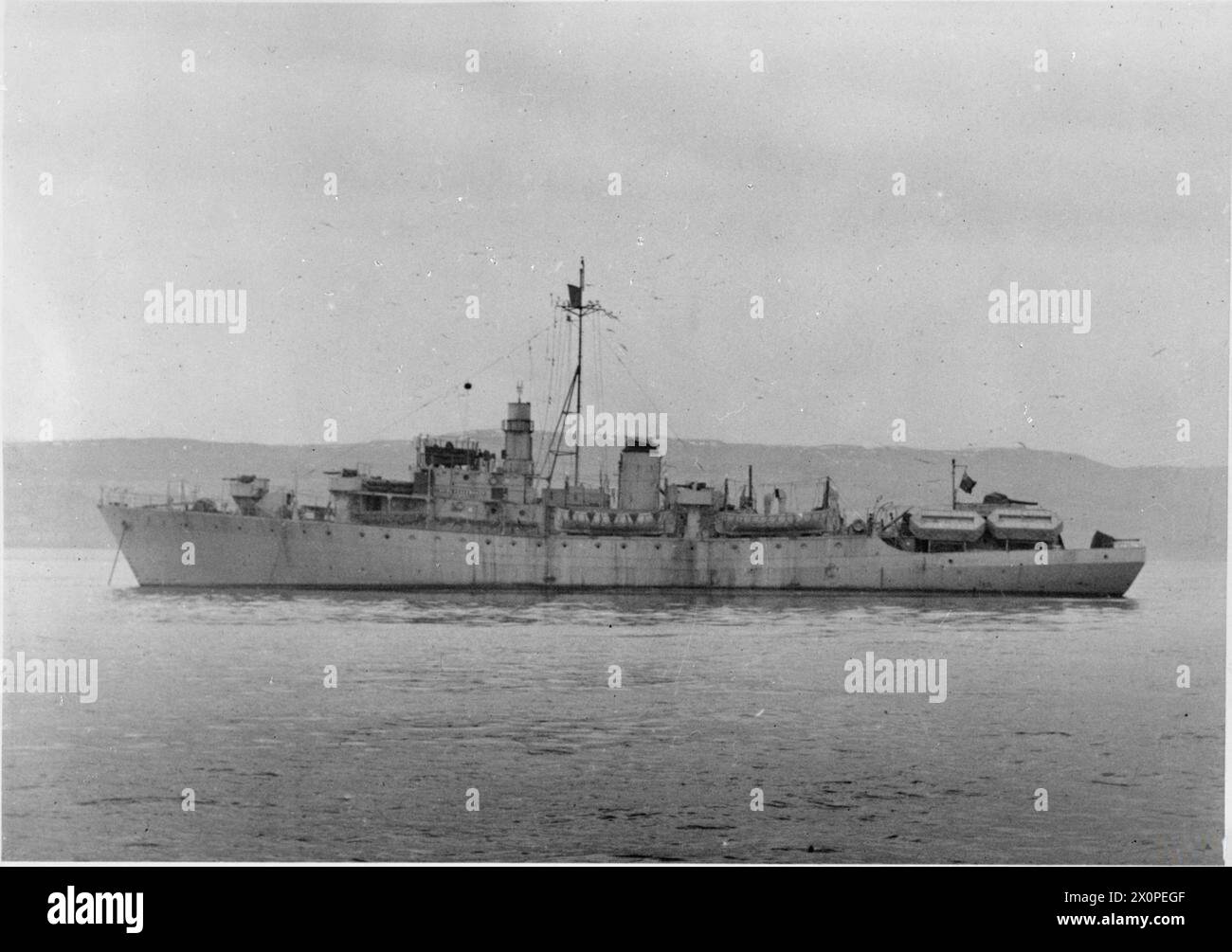 HMS Empire Peacemaker, formerly Scarborough Castle, is at anchor ...