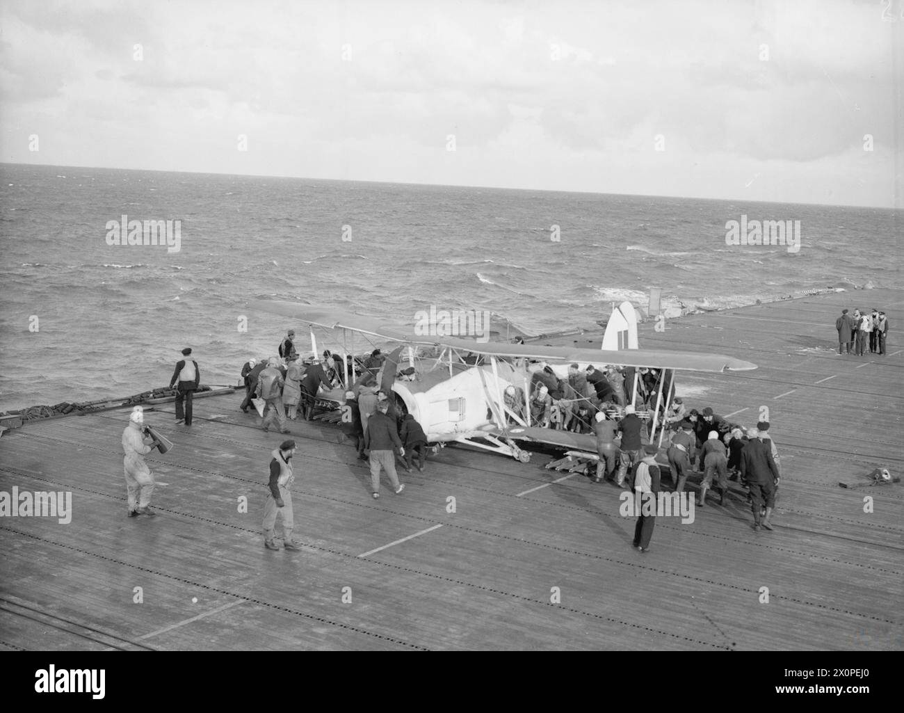 A Fairey Swordfish aircraft on HMS Tracker had its undercarriage ...