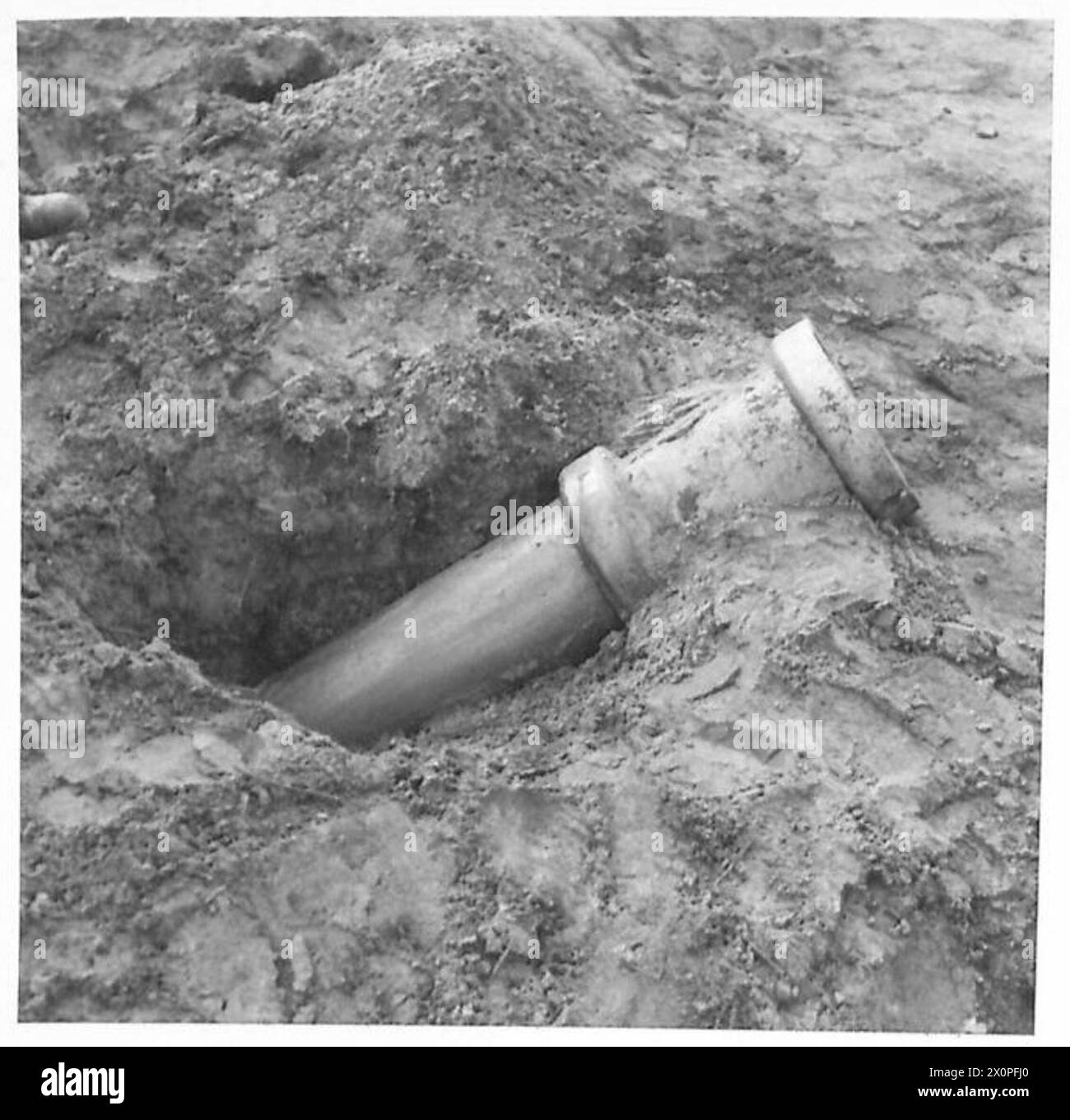 An earthenware pipe filled with water and sealed with cement is used ...