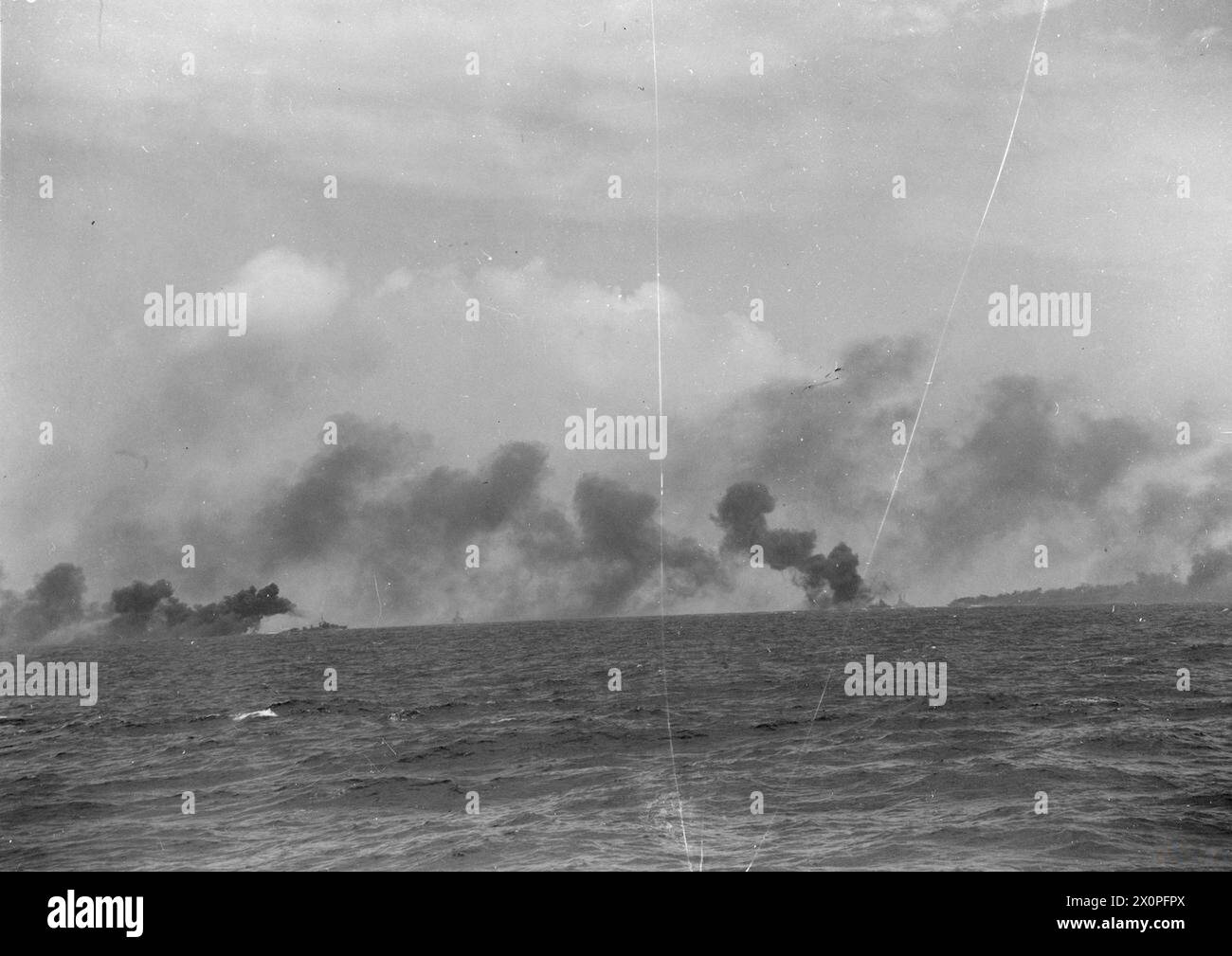 BATTLE PRACTICE FOR BRITAIN'S EASTERN FLEET - LAYING A SMOKE SCREEN ...