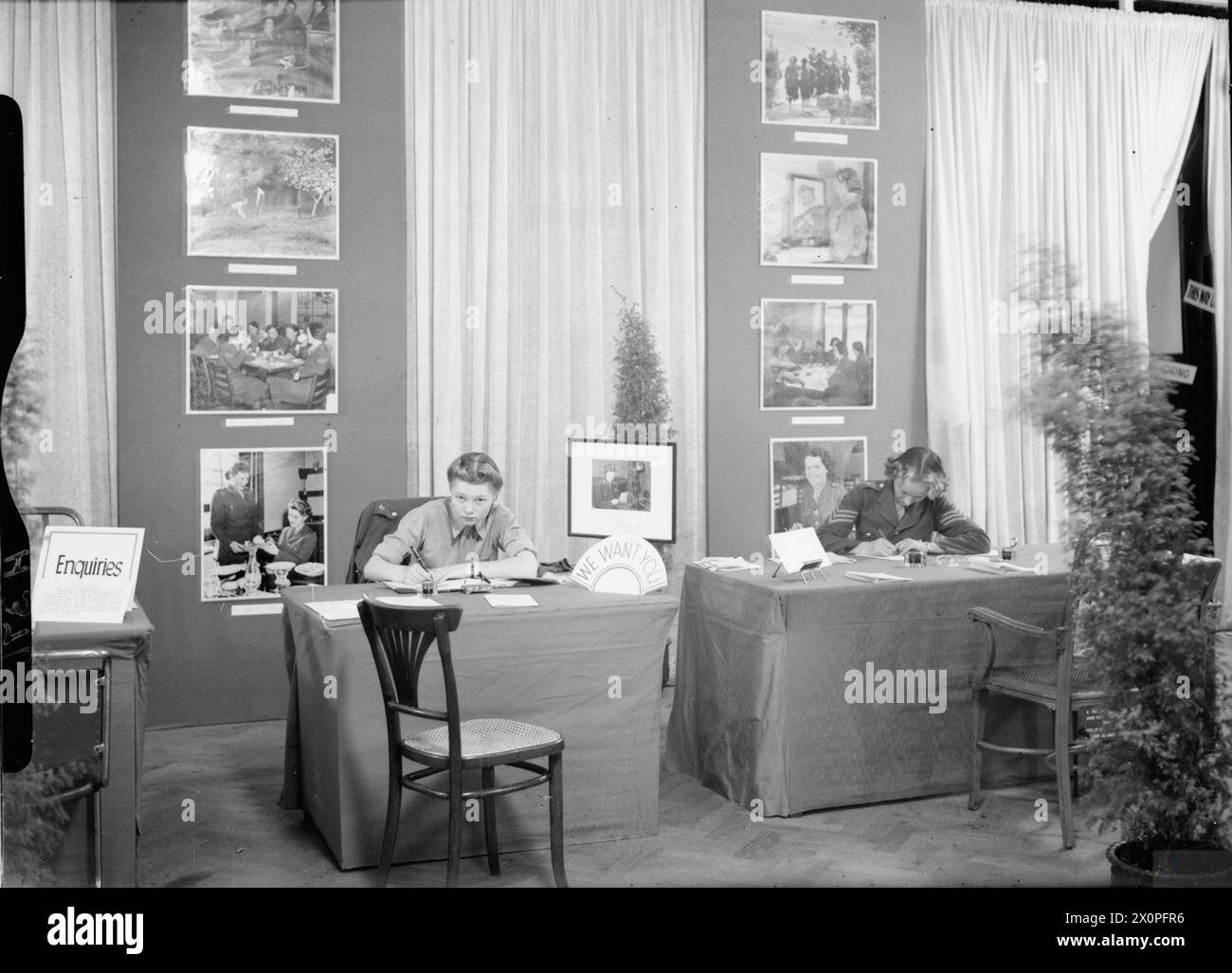 Staff at Selfridges in London man enquiry desks during a recruiting ...