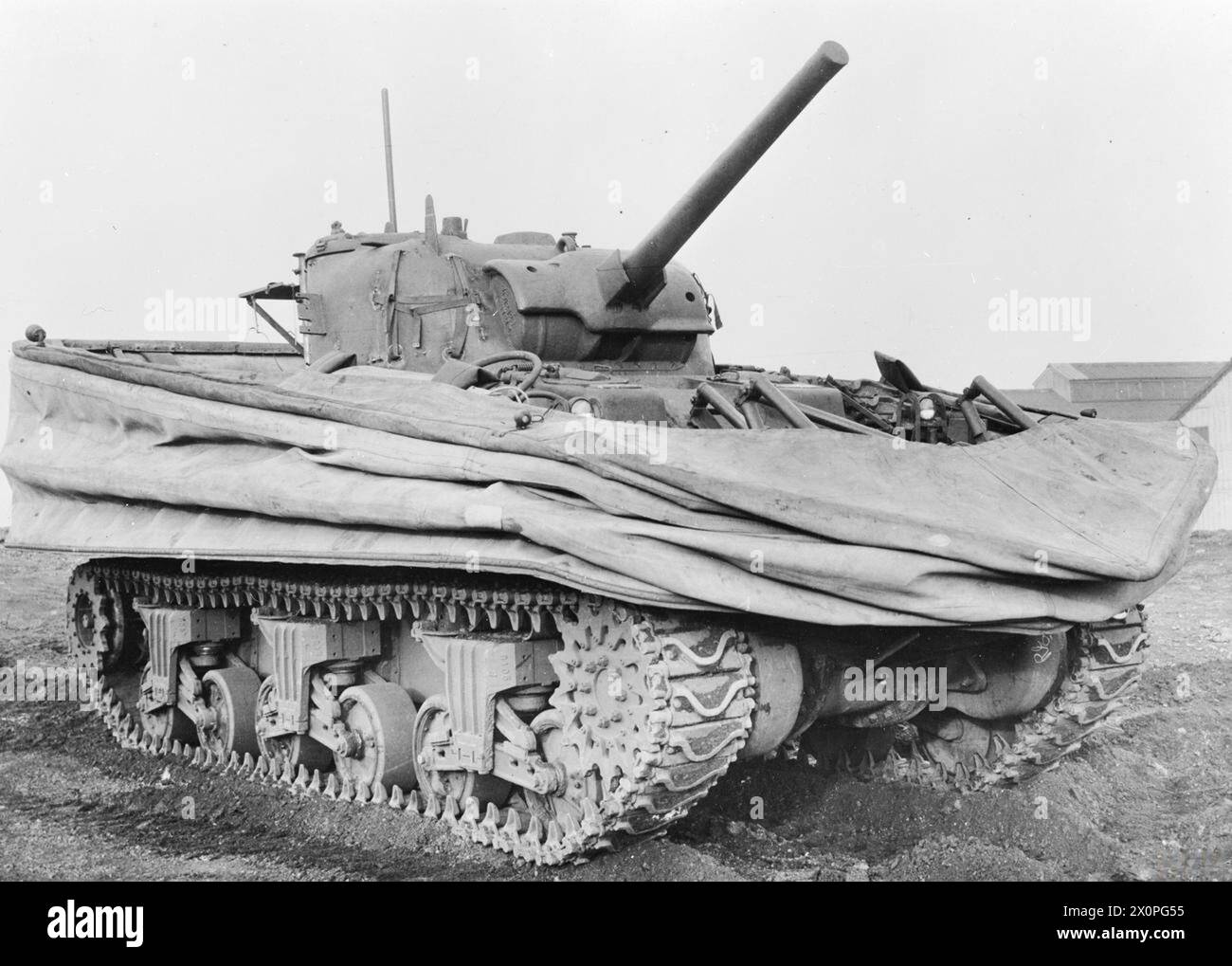 A Sherman DD amphibious tank equipped with waterproof float screens ...