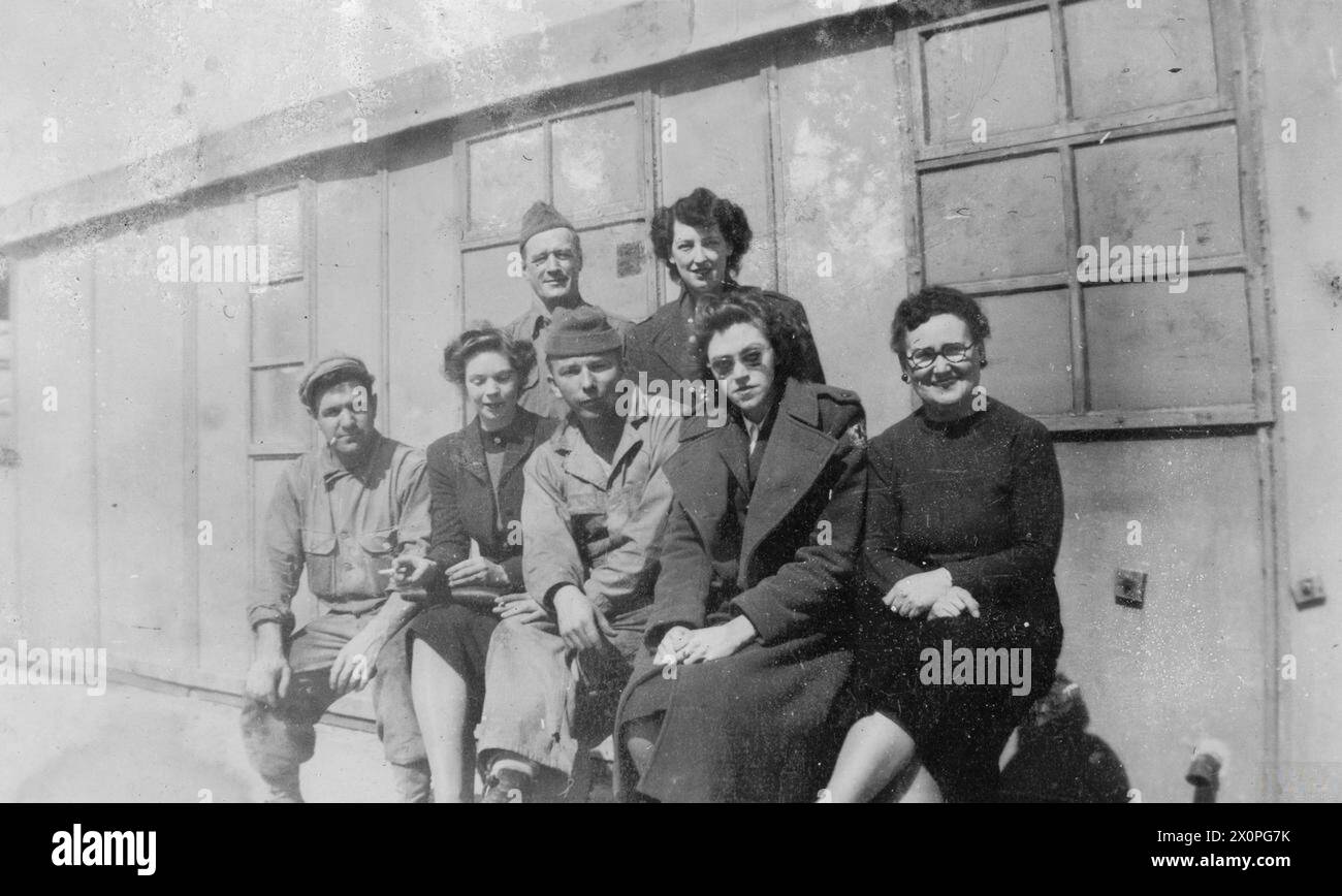 Helen Ormiston is shown with American Red Cross personnel and US Army ...