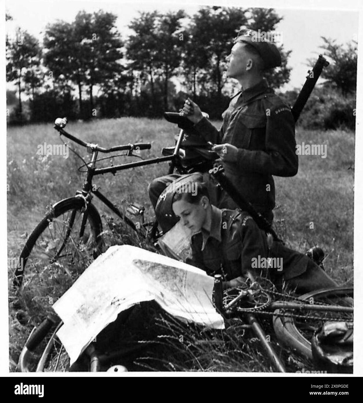 Army Cadet Force members practice map reading while riding bicycles ...