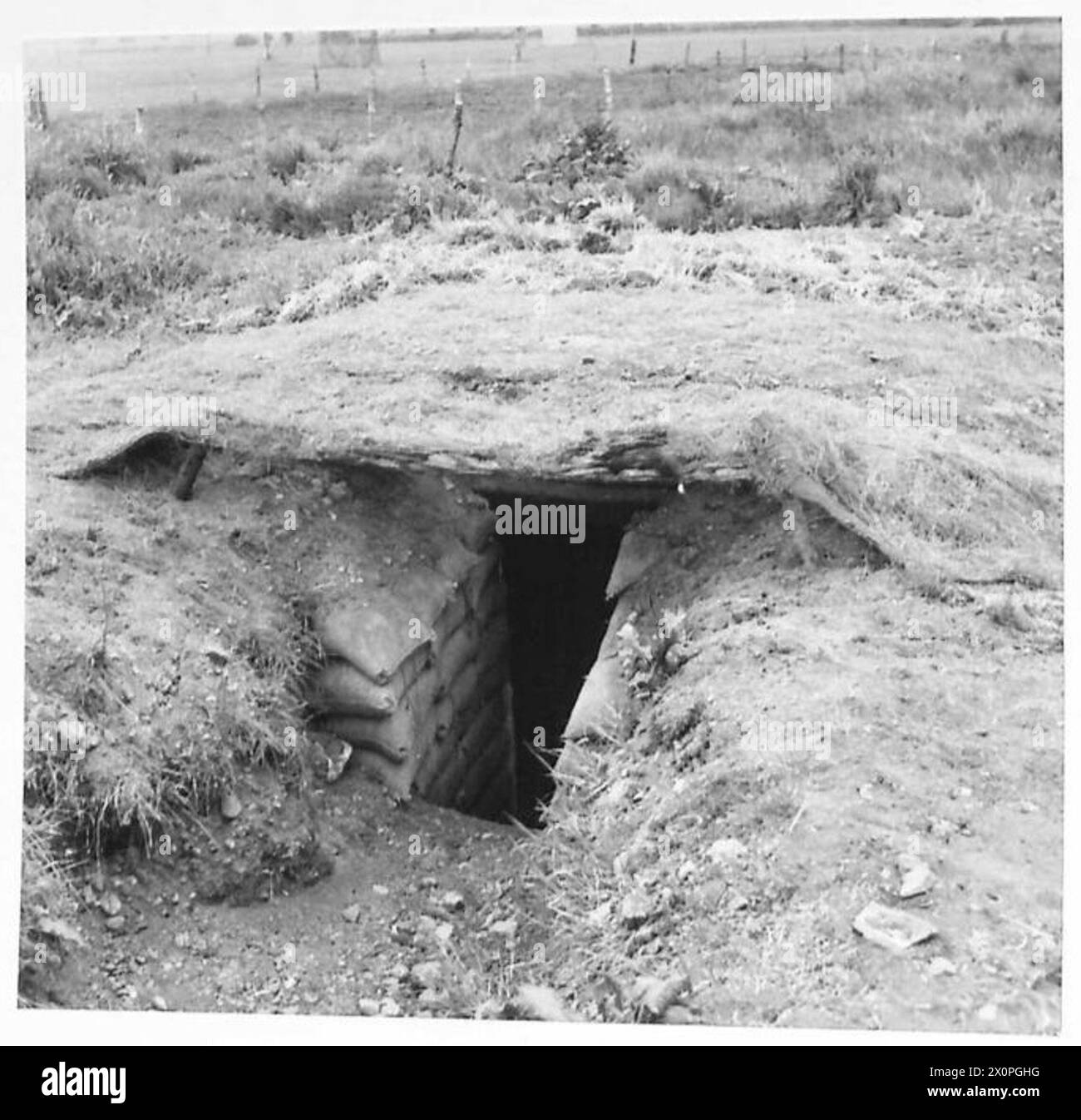 Trenches in various stages of construction are camouflaged ...