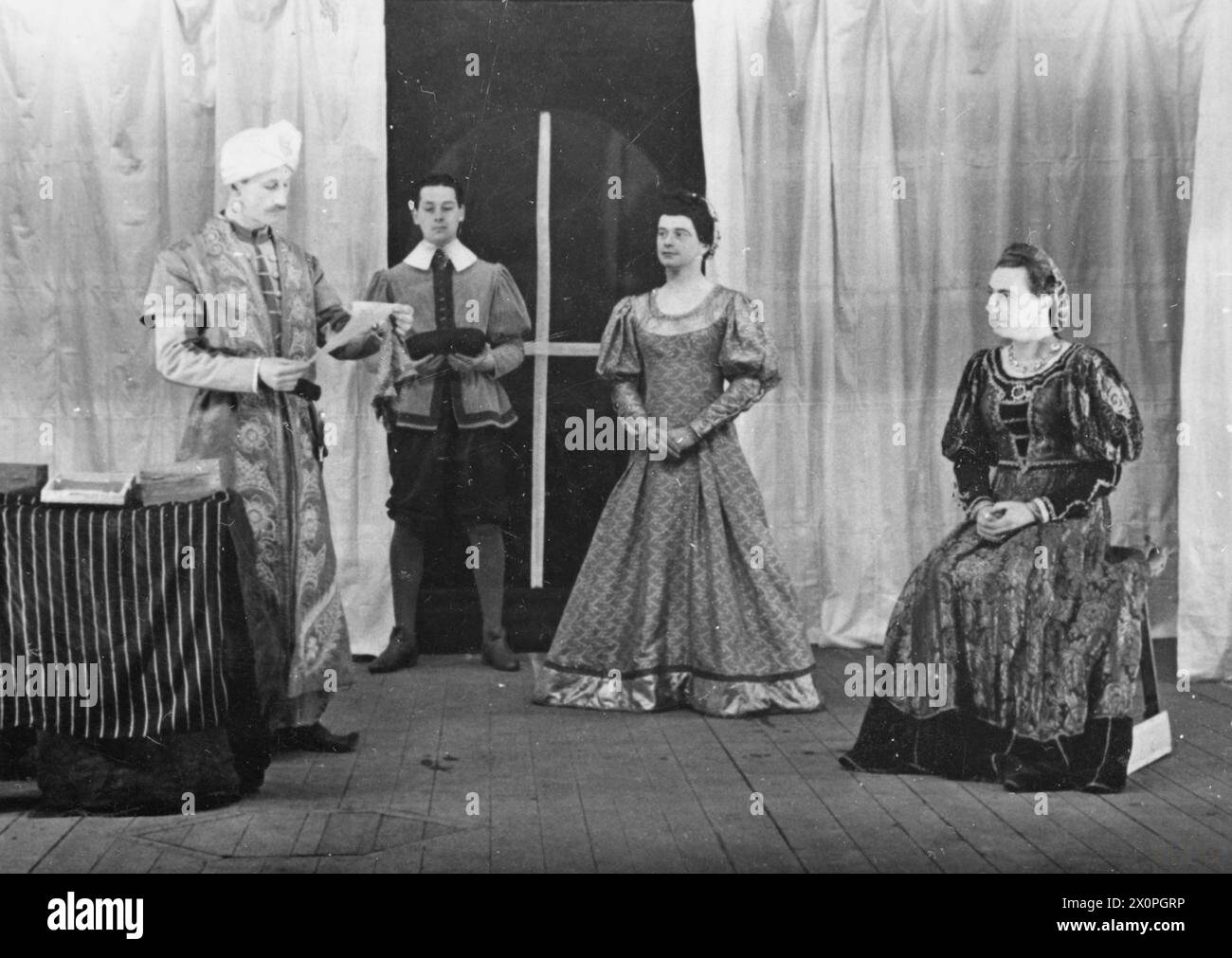 POW actors perform on stage during a theatre show at Stalag Luft III ...